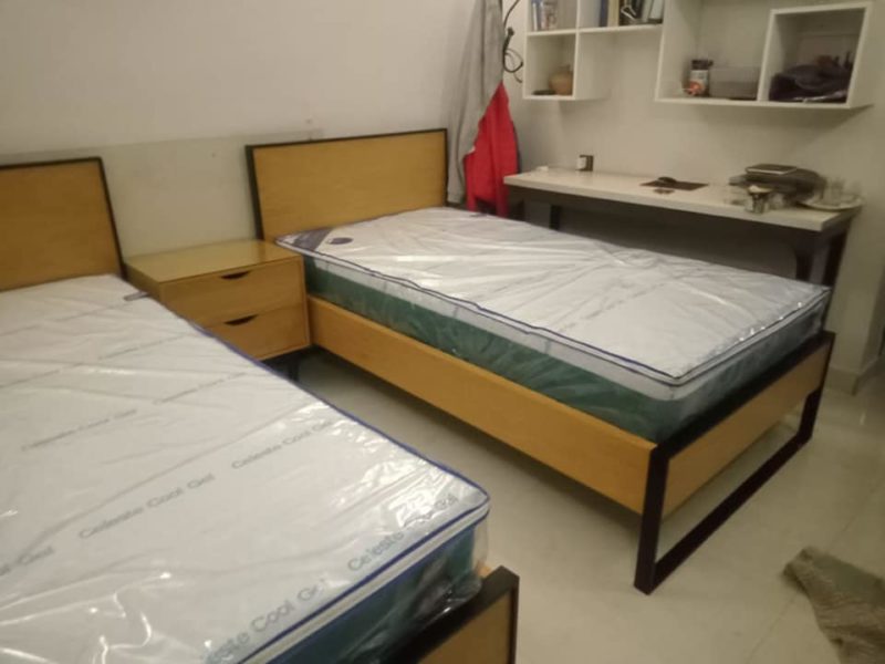 Wooden single bed along with storage to utilize the maximum space